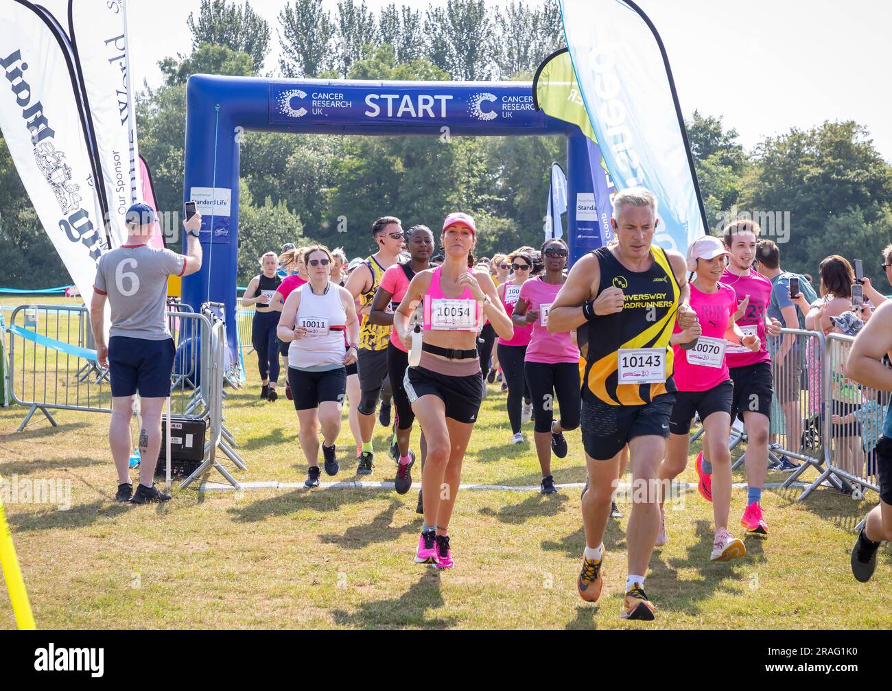Race for Life in aid of Cancer Research. Hundreds of people dressed in ...