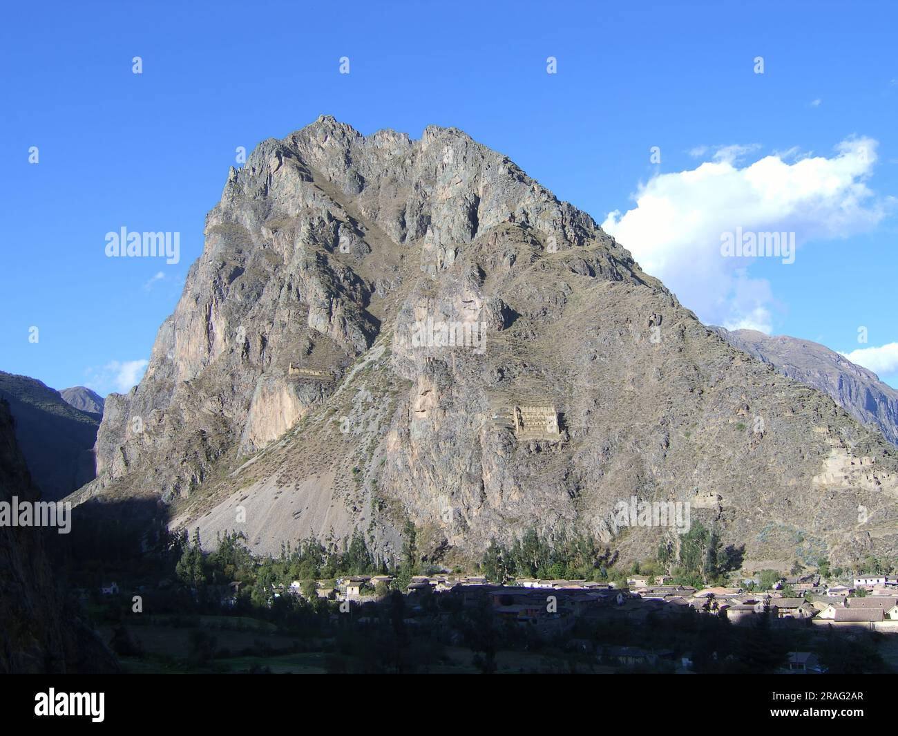 Looking at Mountain Pinkuylluna from Ollantaytambo, with a face of ...