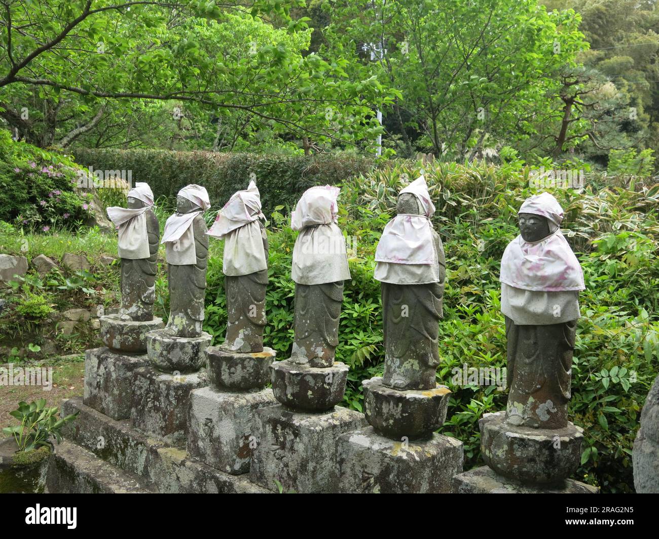 Jizo statues commonly appear in groups of six, guardians of children ...