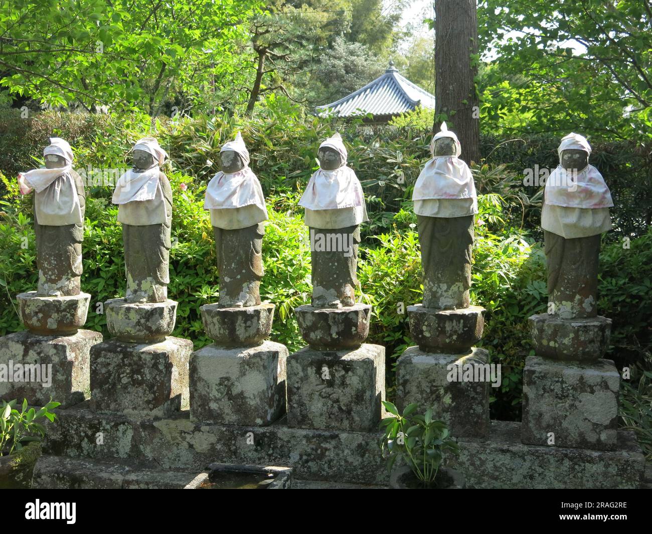 Jizo statues commonly appear in groups of six, guardians of children ...