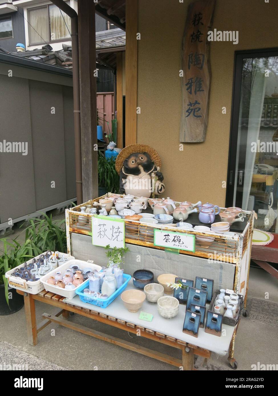 A display of traditional pottery for sale outside a shop in the old ...