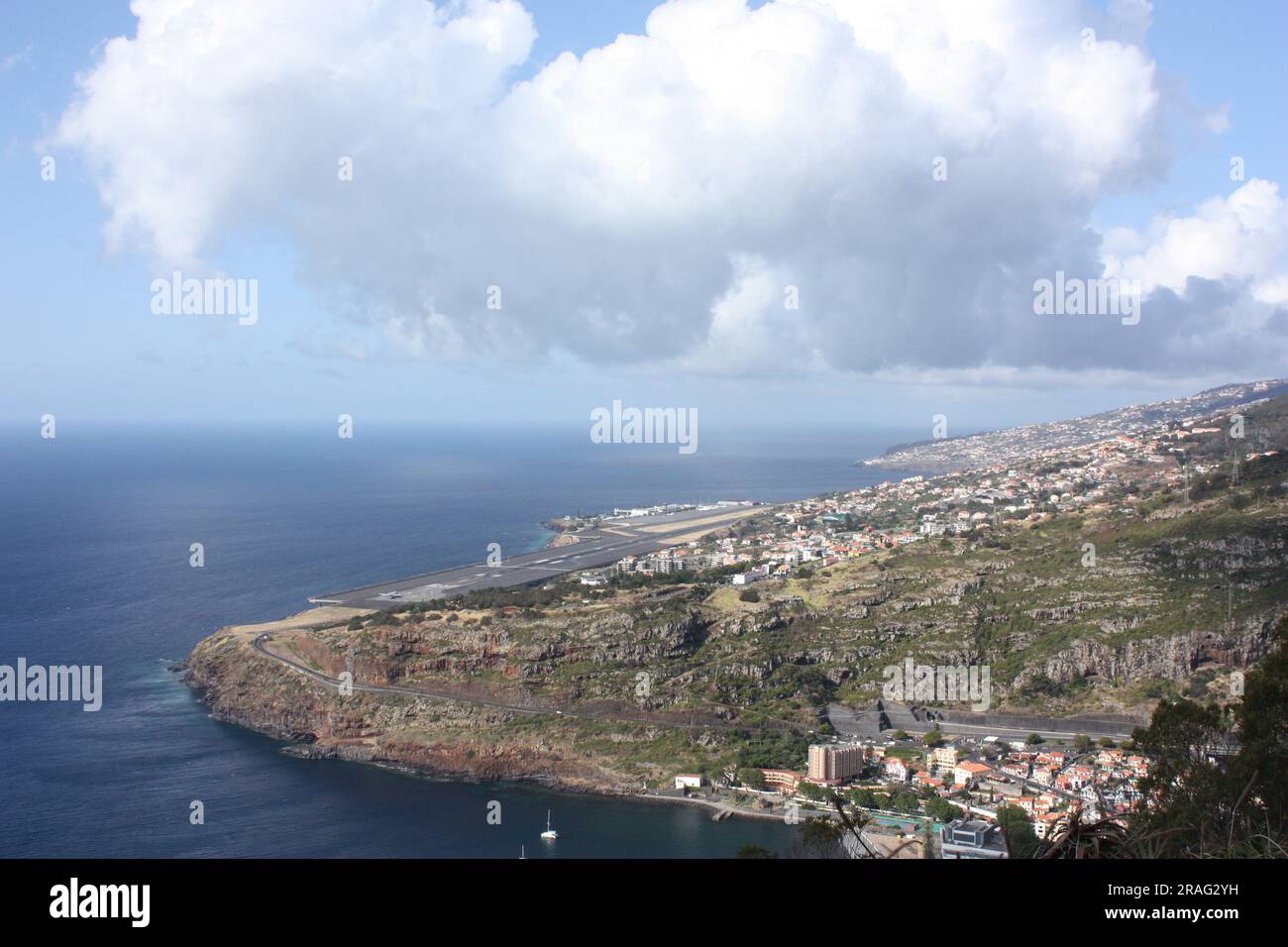 A view of Madeira airport from a nearby viewpoint Miradouro do Pico do ...