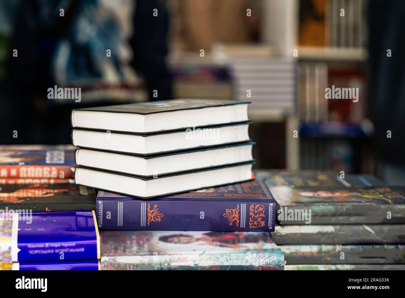 Closeup of books Stack on table in book store. Education, school, study ...