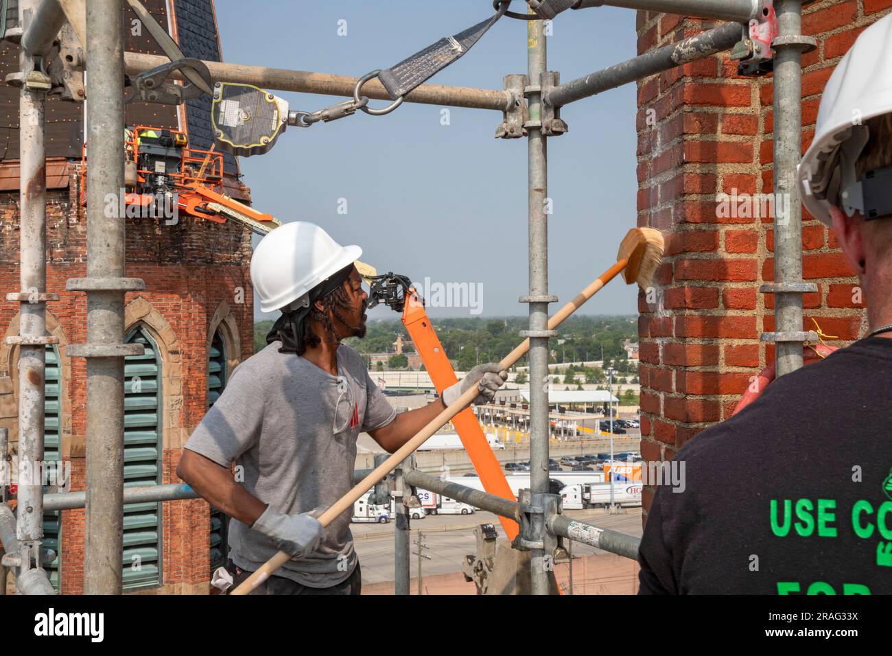Detroit, Michigan - Anthony Powell cleans the bell towers of the ...