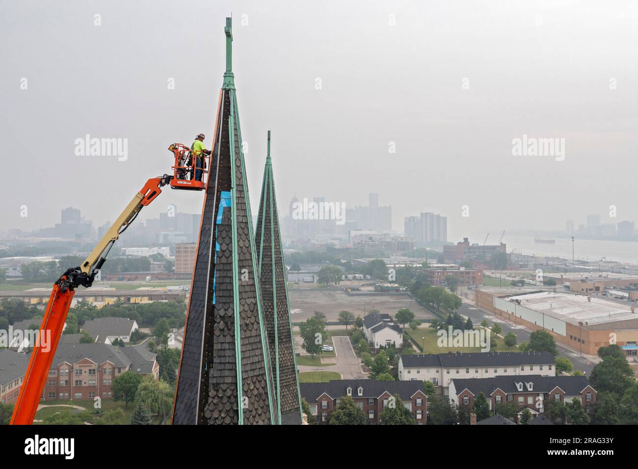 Detroit, Michigan - Workers repair the towers of the Basilica of Ste ...