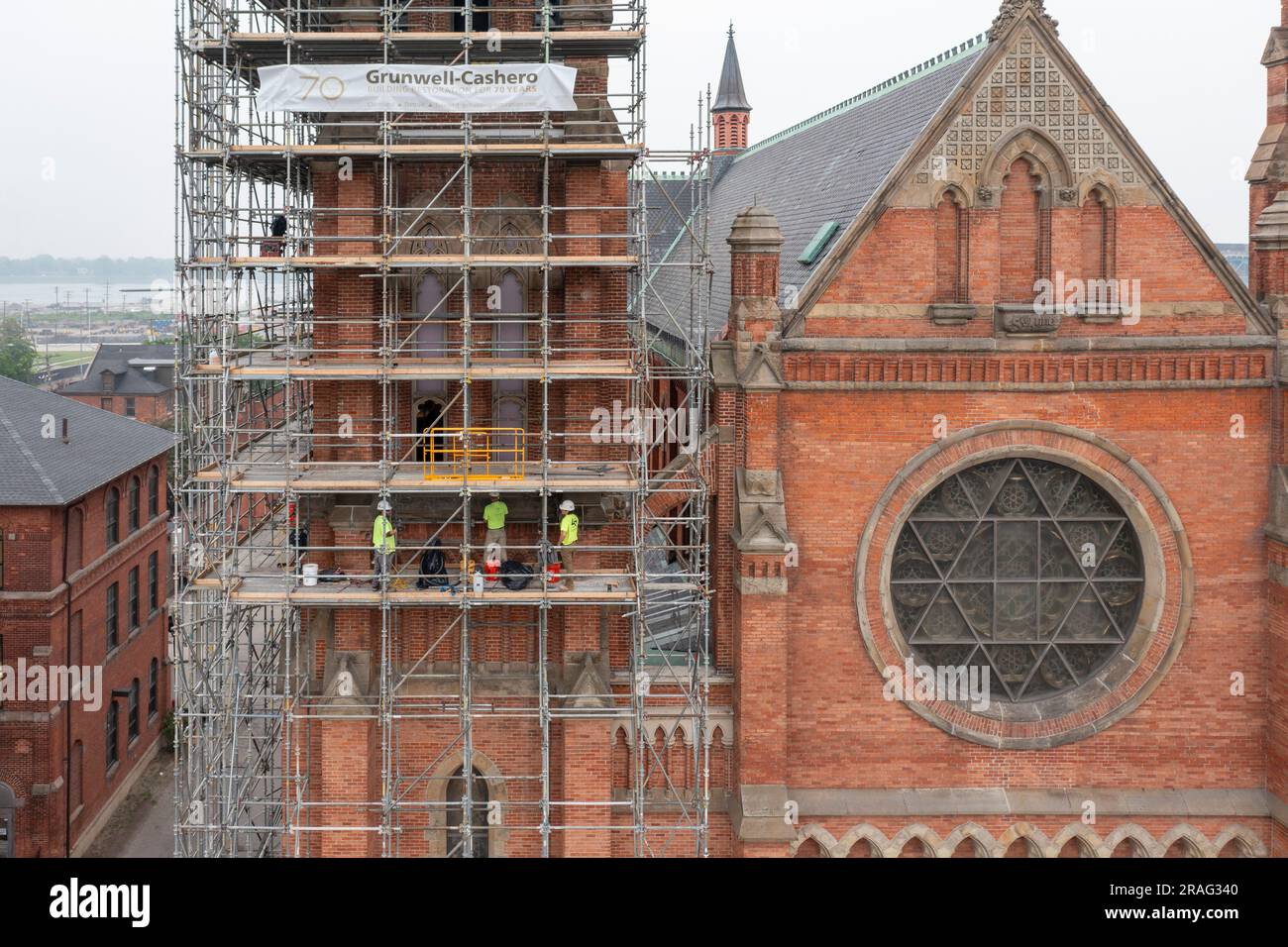 Detroit, Michigan - Workers repair the towers of the Basilica of Ste ...