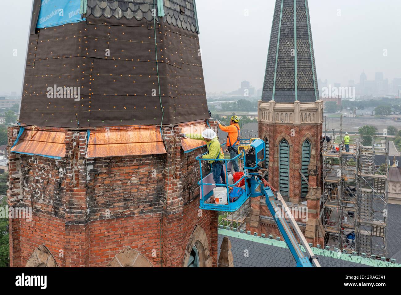 Detroit, Michigan - Workers repair the towers of the Basilica of Ste ...