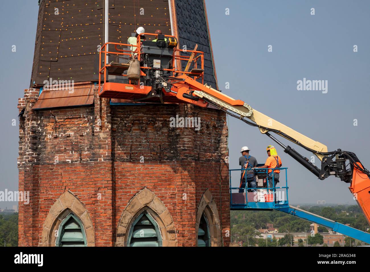 Detroit, Michigan - Workers repair the bell towers of the Basilica of ...