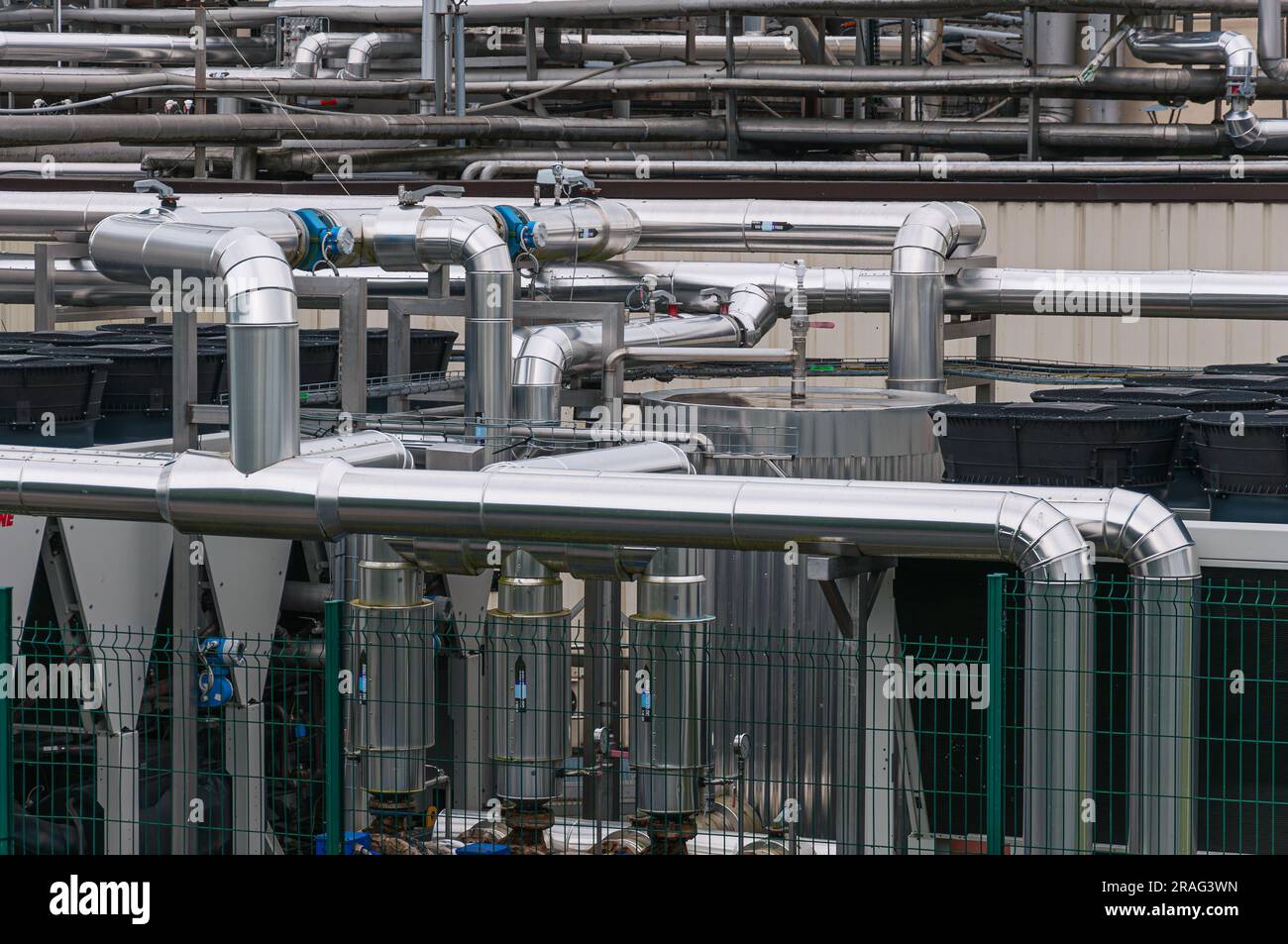 Equipment, cables and pipelines outside a modern cheese factory in ...
