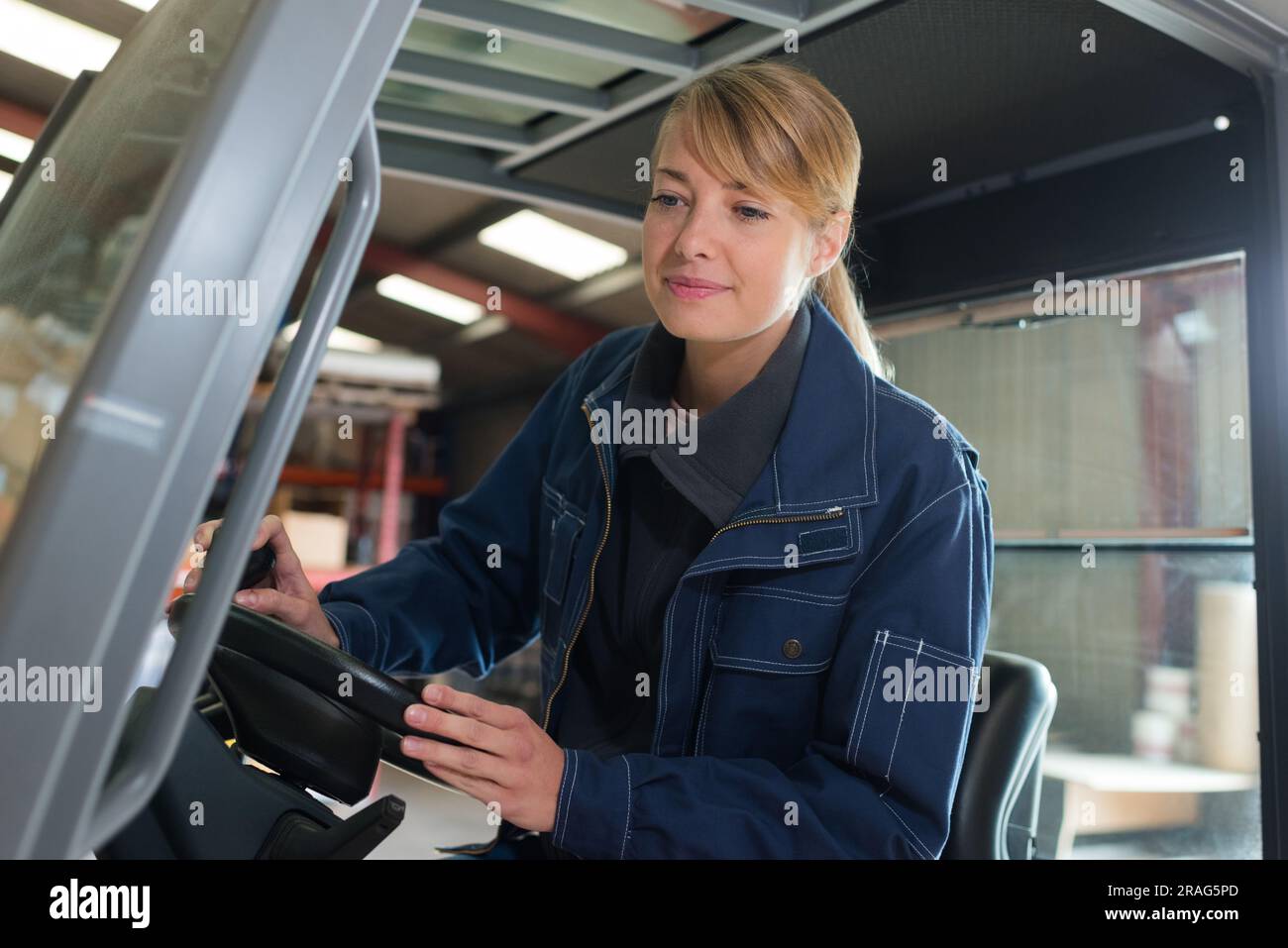 Worker operating a forklift hi-res stock photography and images - Alamy