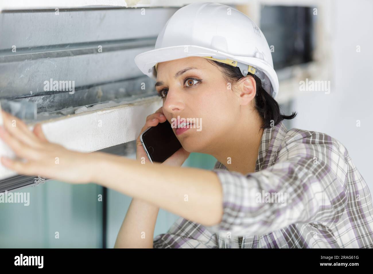 Sunlight woman builder engineer worker hi-res stock photography and ...