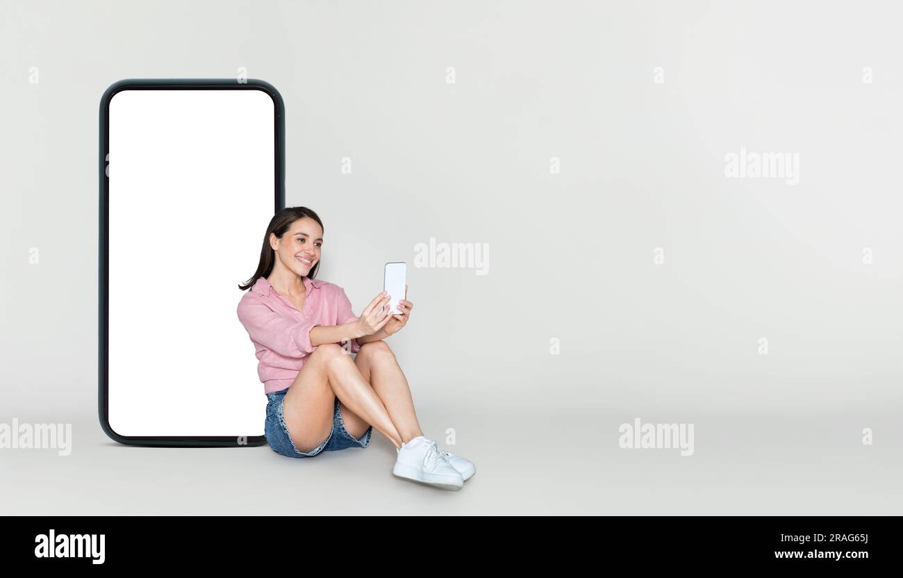 Sweet beautiful millennial lady using cell phone, have video call Stock ...