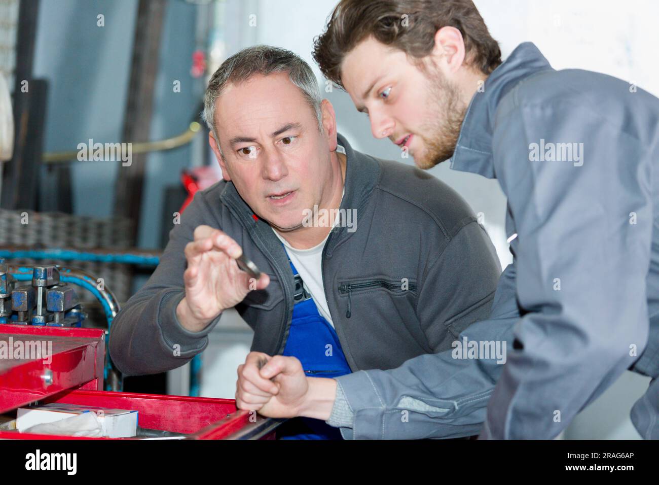 apprentice and teacher Stock Photo - Alamy
