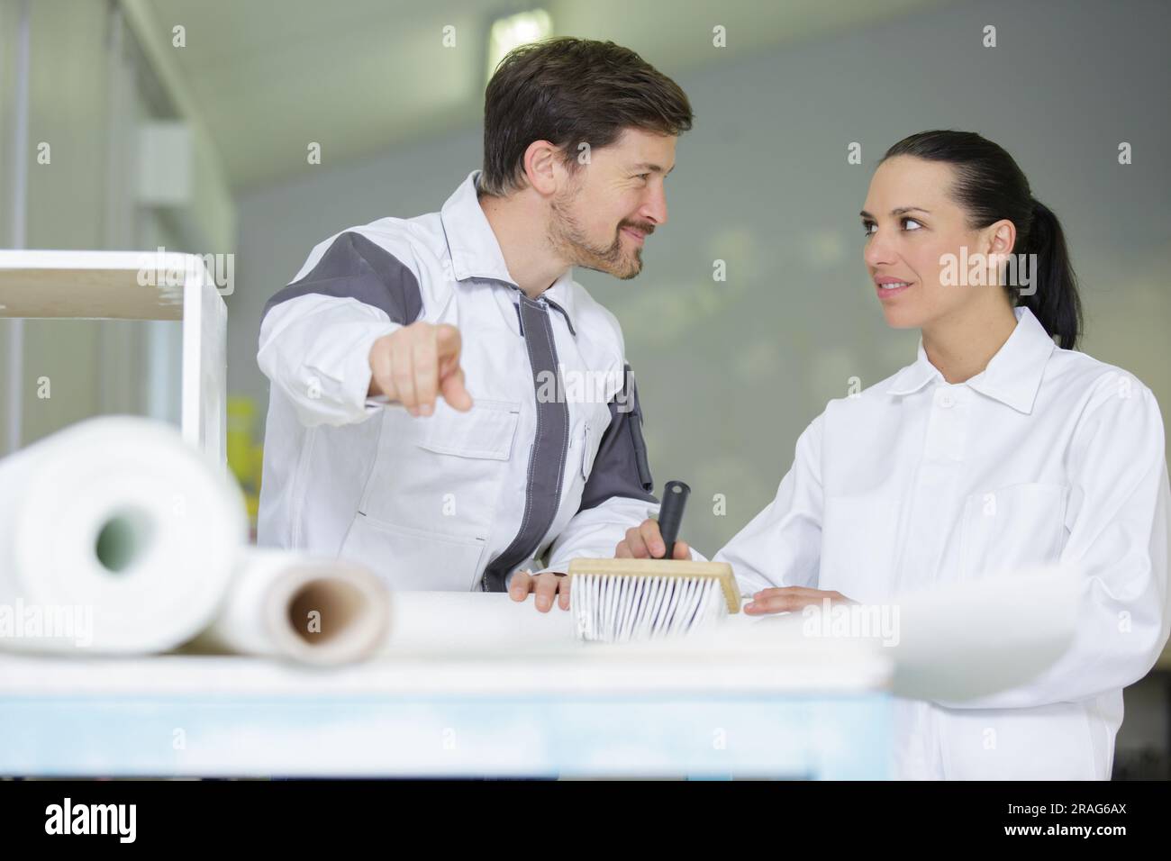 team of a male and female professional painters Stock Photo - Alamy