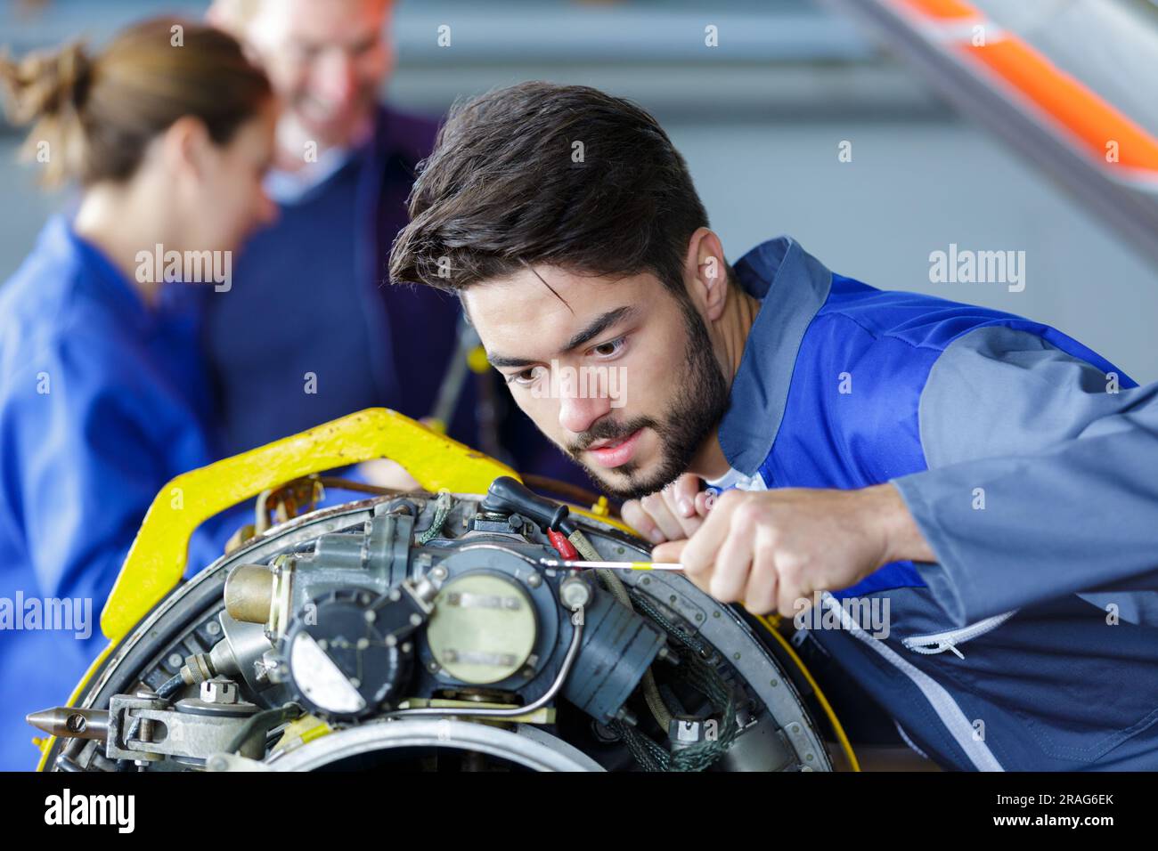 portrait of a man fixing automotive engine Stock Photo - Alamy