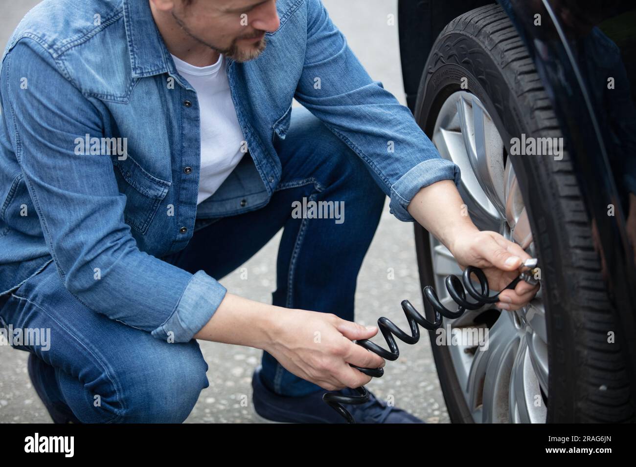 Air compressor hose gas station hi-res stock photography and images - Alamy