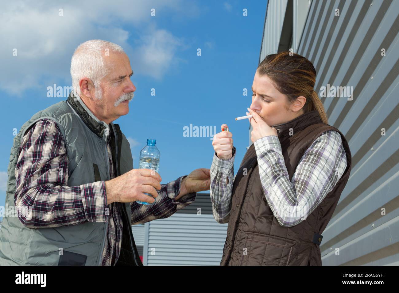 young builder woman construction worker smoking cigarette Stock Photo ...