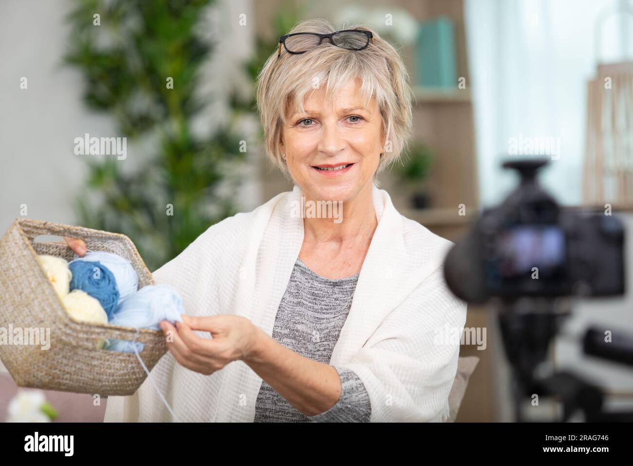 Mature woman filming hi-res stock photography and images - Alamy