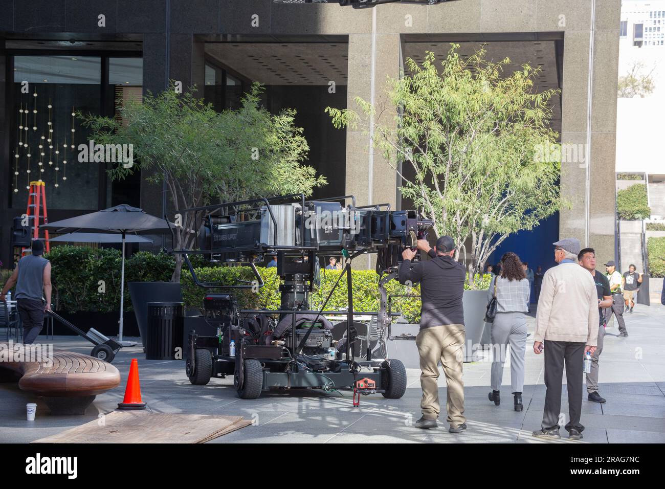 Crew and extras filming a movie on Flower Street in Downtown Los ...