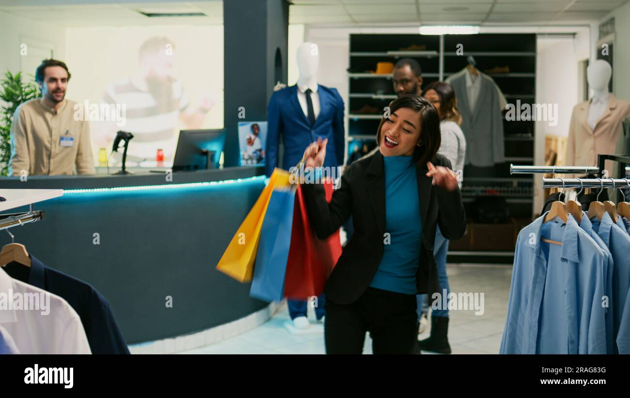 Cheerful woman showing dance moves hi-res stock photography and images ...