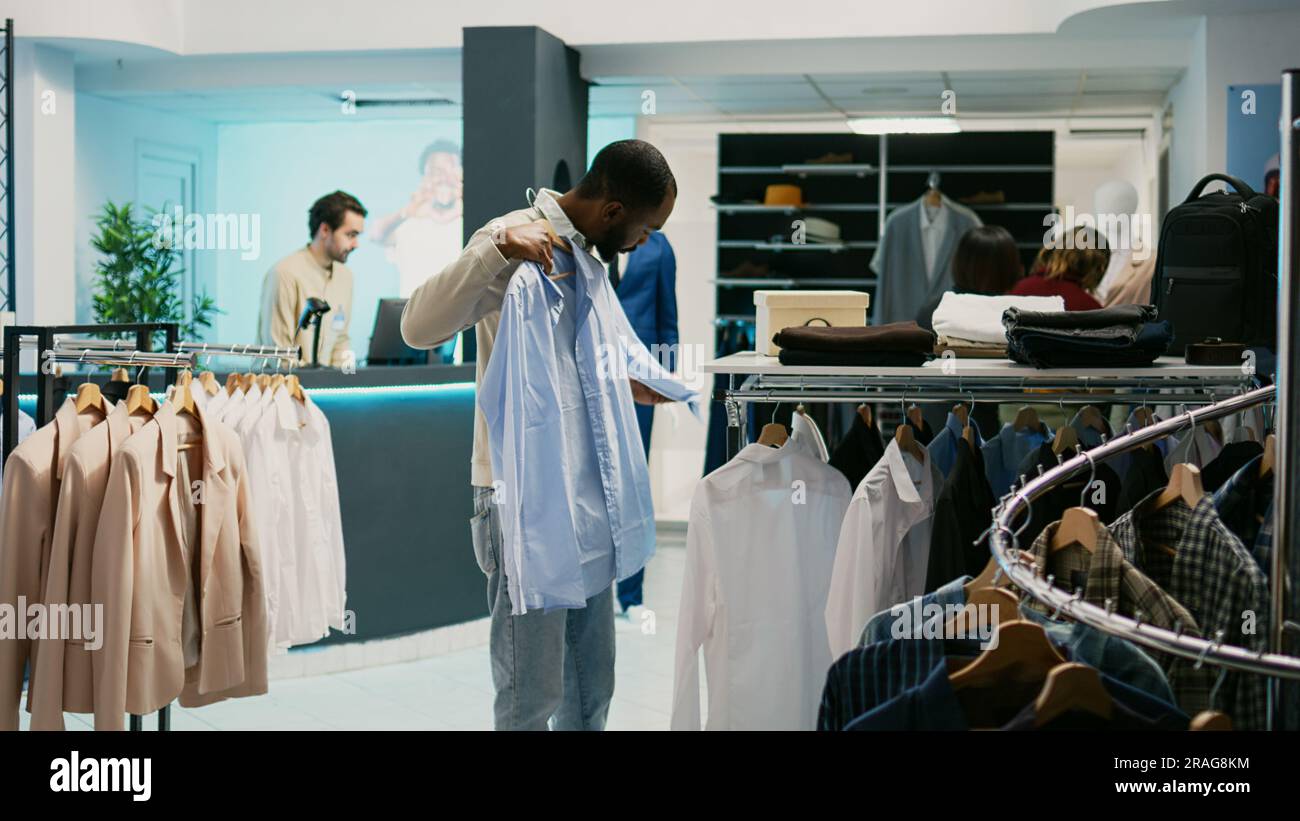 African american client examining fabric hi-res stock photography and ...