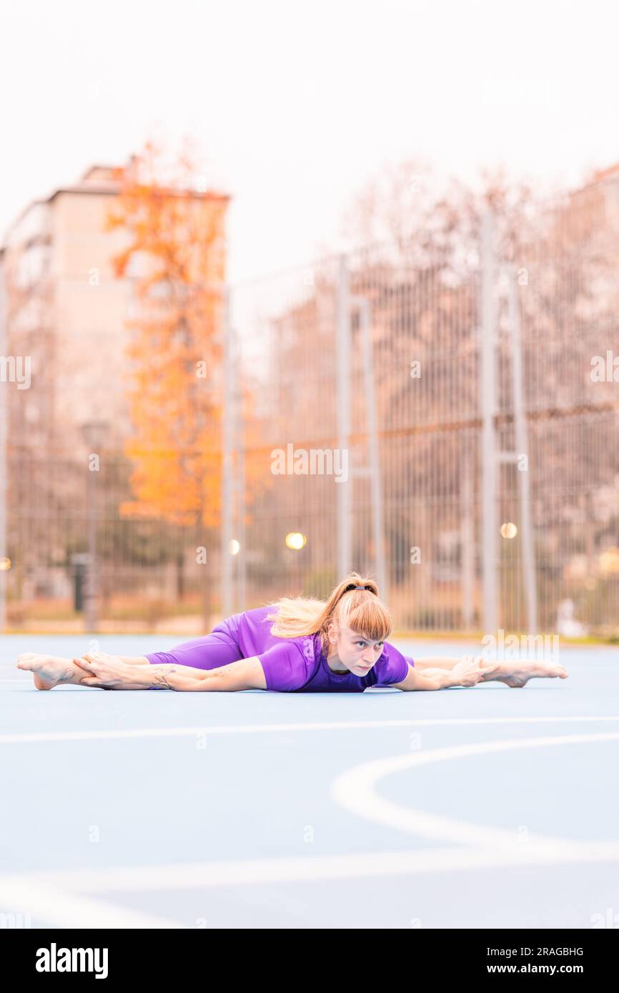 Morning sport warm up stretching balance. Hispanic mid female ...