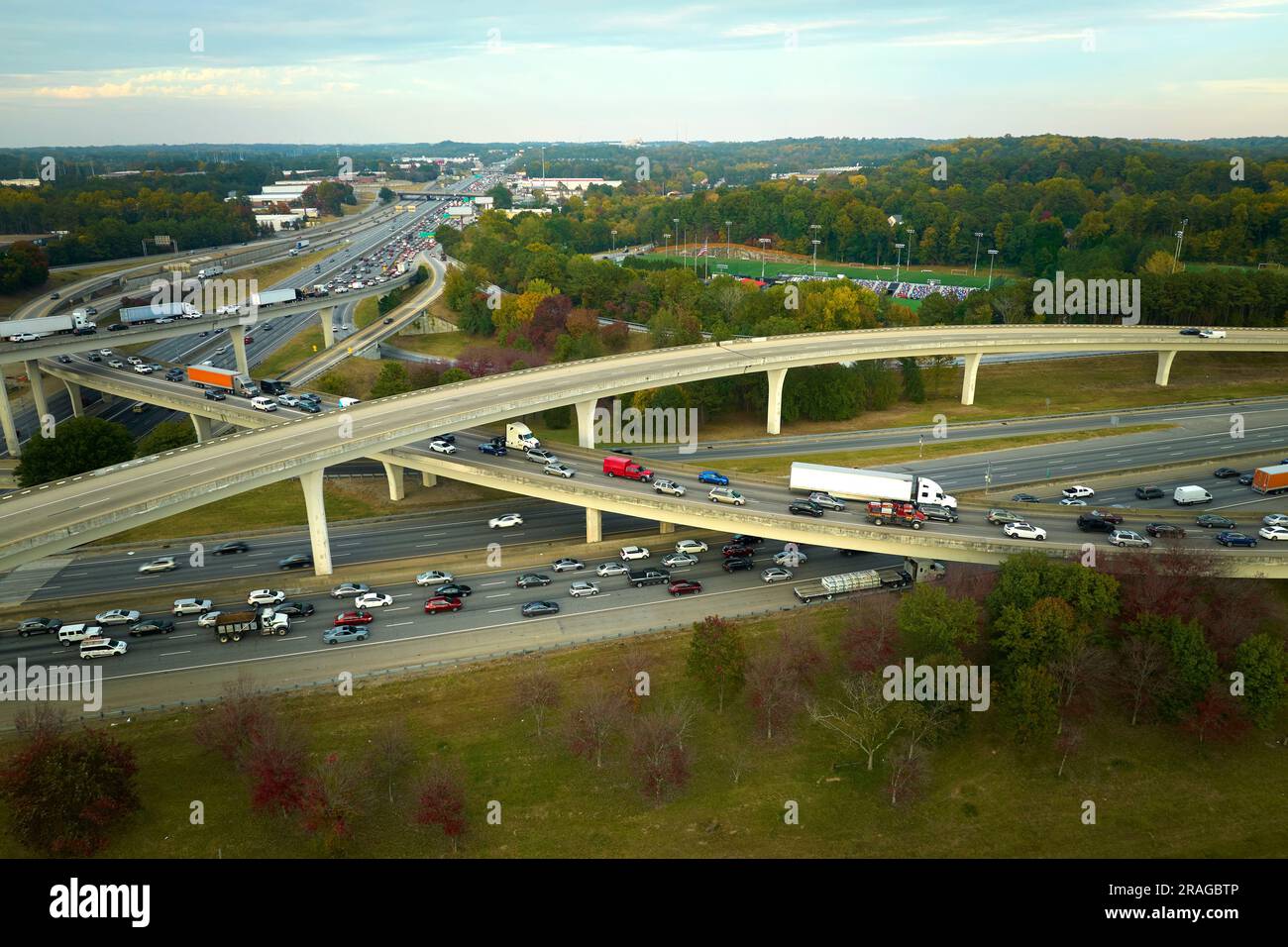 Aerial view of american freeway intersection with fast moving cars and ...