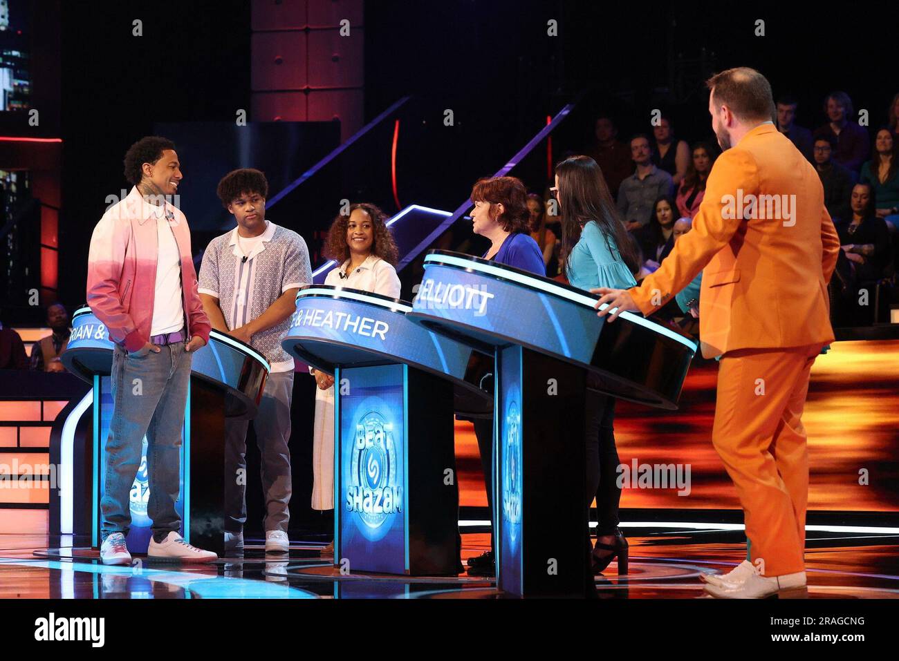 BEAT SHAZAM, from left: host Nick Cannon, contestants Brian & Talia ...