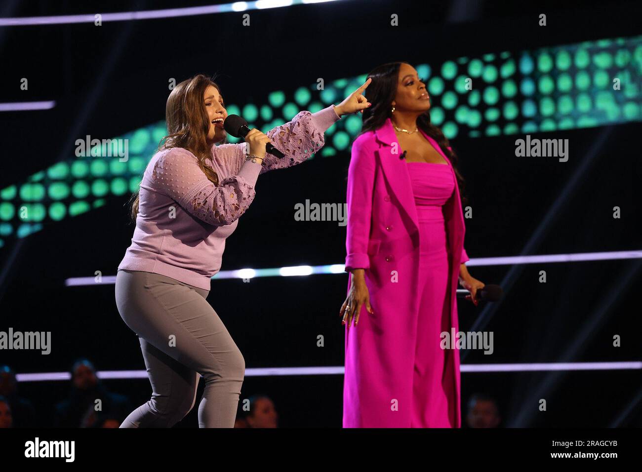 DON'T FORGET THE LYRICS, from left: contestant Mary Ashton, host Niecy ...