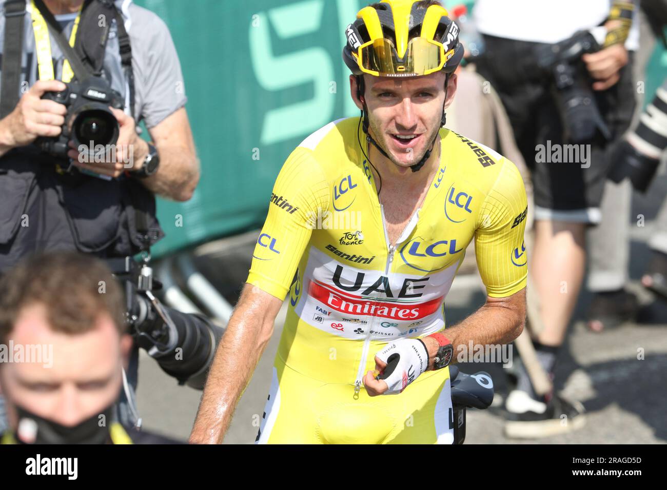 Adam Yates of GB , UAE Team Emirates in yellow jersey Stock Photo - Alamy