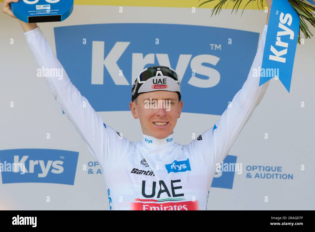 Tadej Pogacar in white on podium after stage 3 tour de france ...