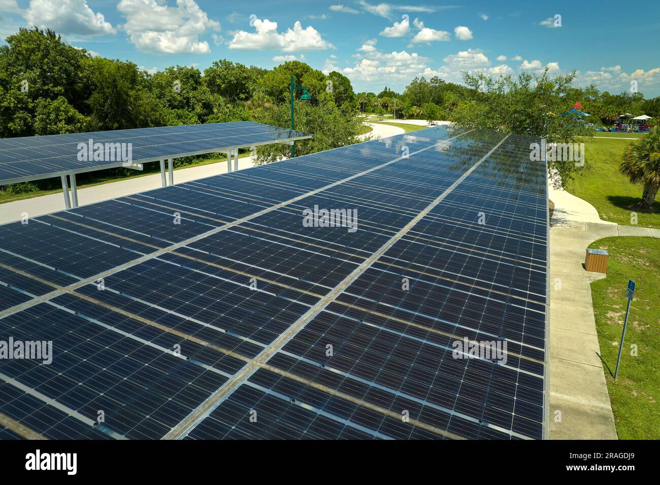 Aerial view of solar panels installed as shade roof over parking lot ...