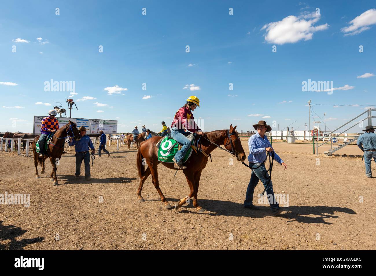 Horses and Jockeys in a paddock getting ready to race in the ABC Bush ...