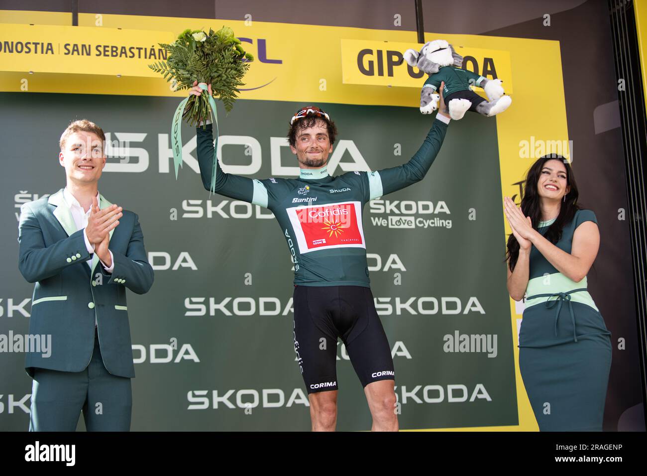 Victor Lafay on the podium in San Sebastian with the green jersey of ...