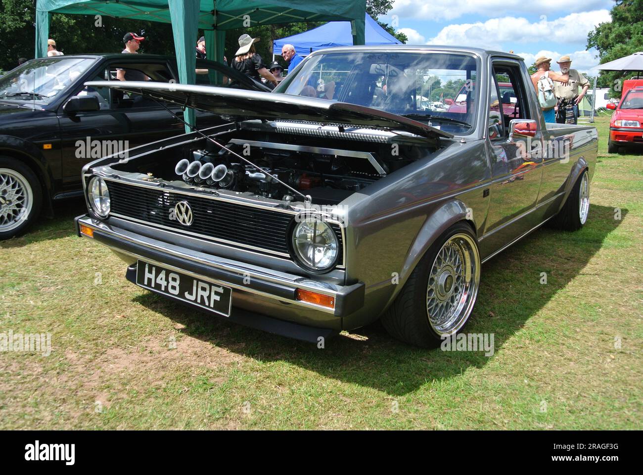 A 1990 Volkswagen Caddy pickup truck parked on display at the 47th ...