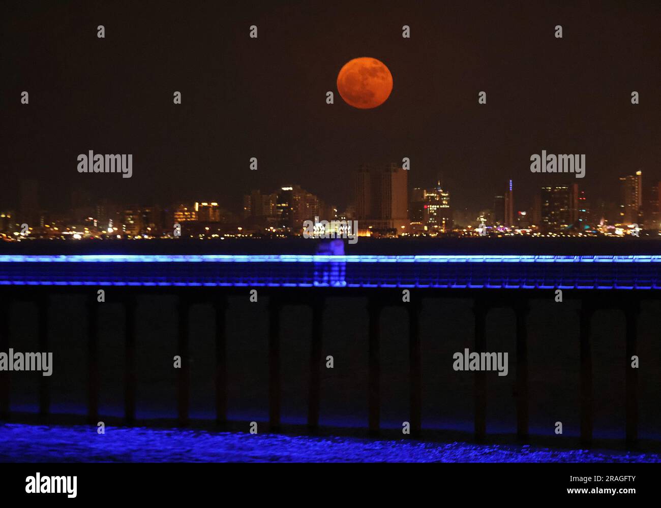 Kuwait City, Kuwait. 3rd July, 2023. A full moon is seen over Kuwait ...