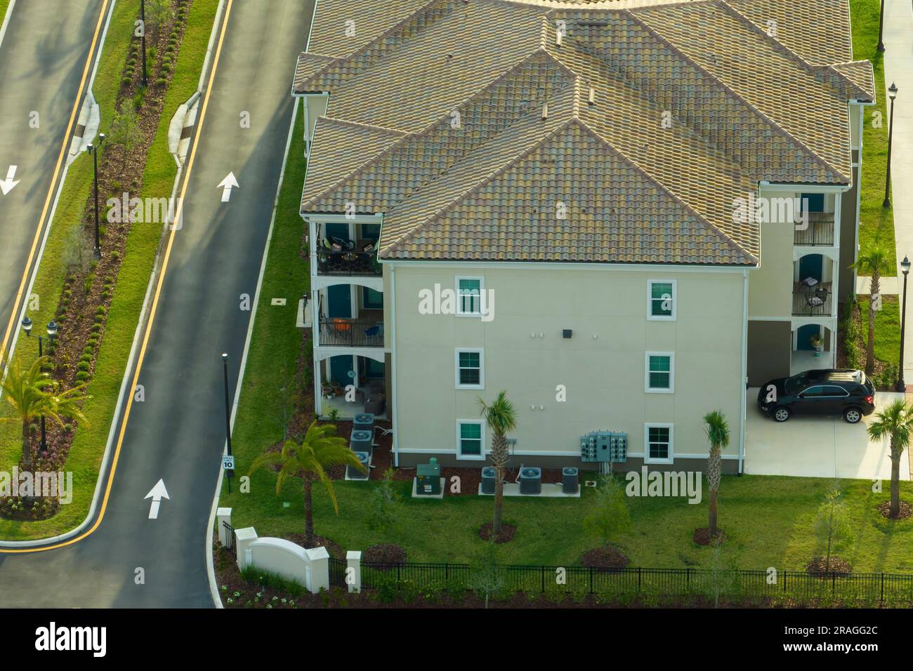 Top view of new apartment condos in Florida suburban area. Family ...