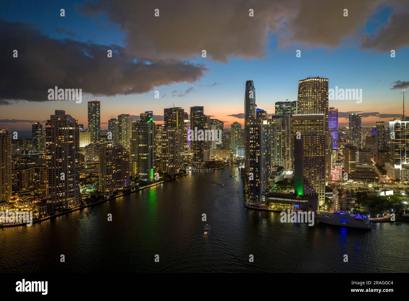 View from above of brightly illuminated high skyscraper buildings in ...