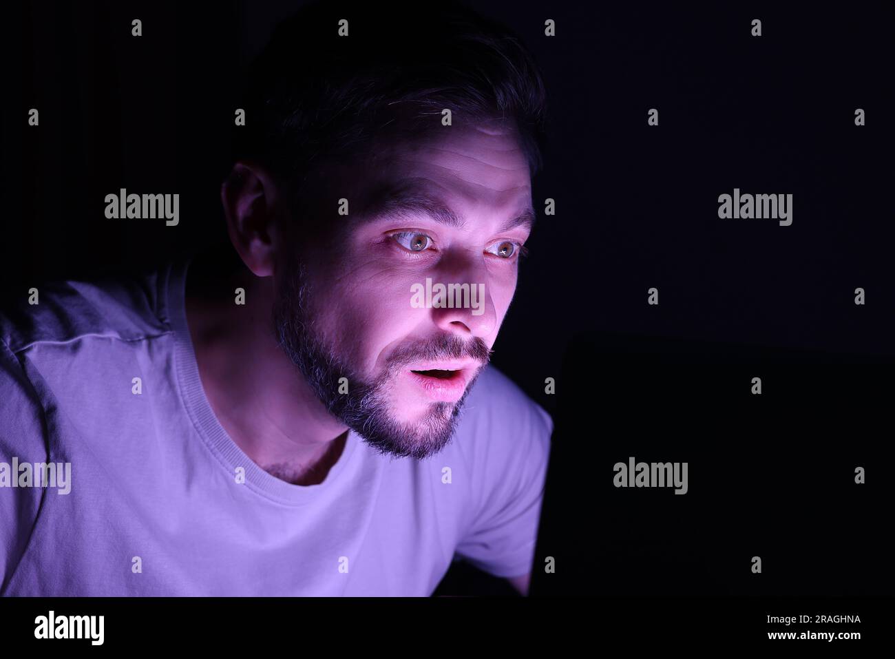 Man using computer at night. Internet addiction Stock Photo - Alamy