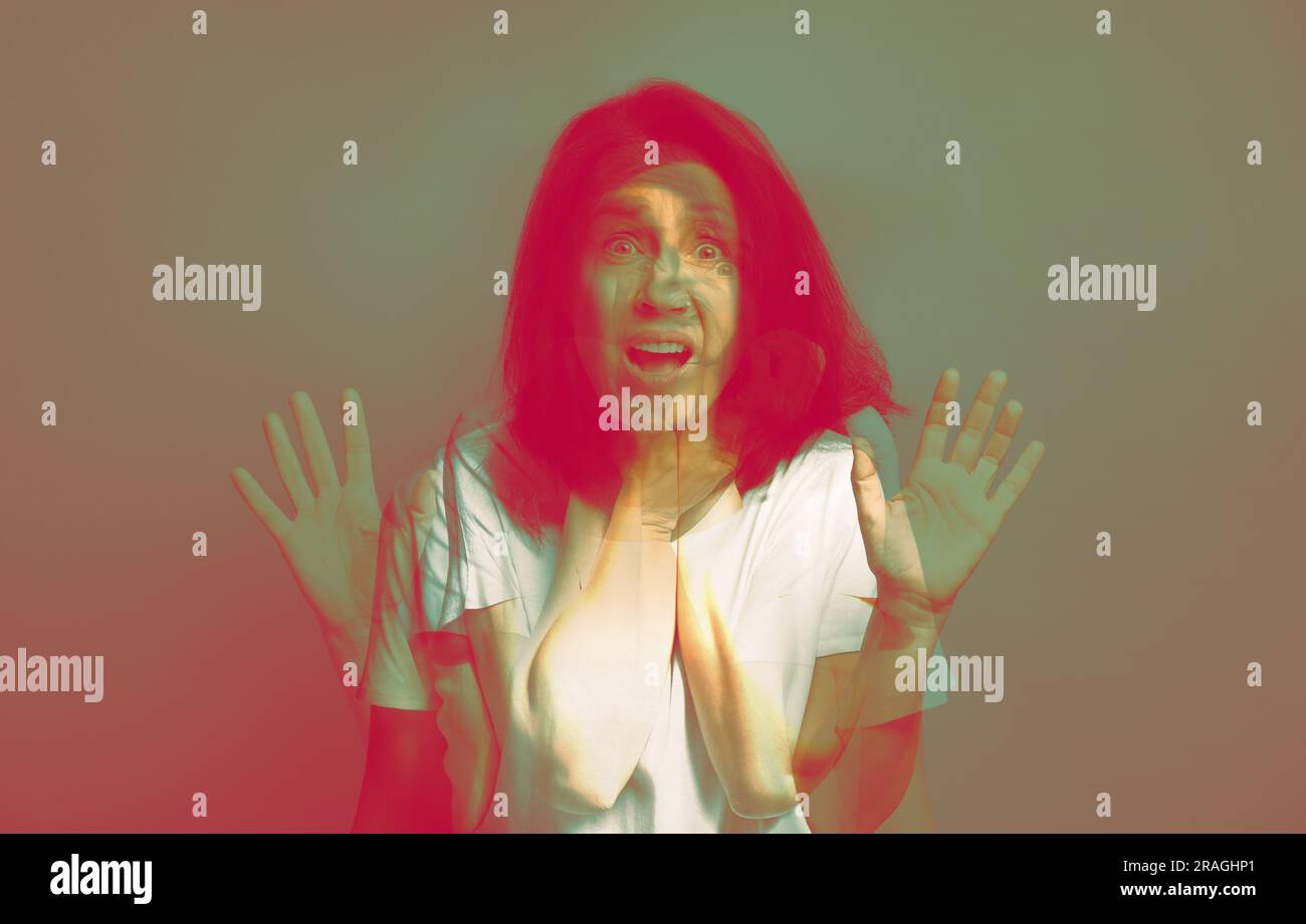 Paranoia. Multiple exposure with photos of emotional woman, color toned ...