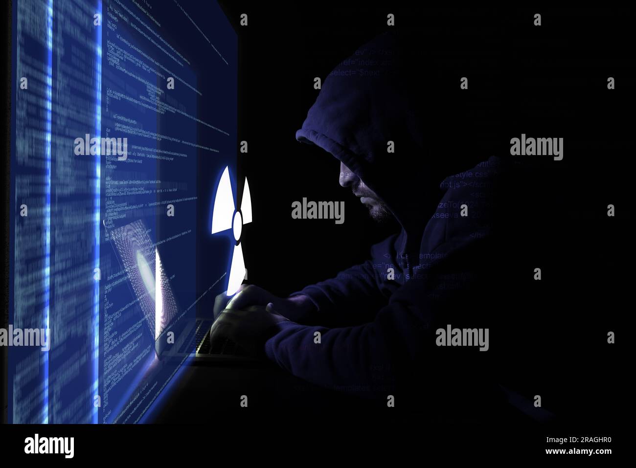 Nuclear deterrence. Hacker using computer in darkness, virtual screen with code and warning ...