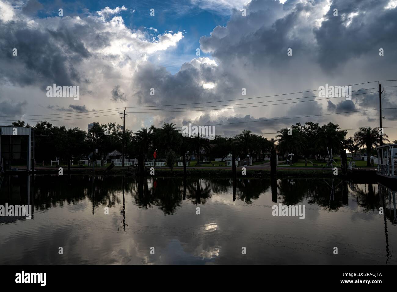Reflected sky in the relatively calm Bayou Lafourche Stock Photo - Alamy