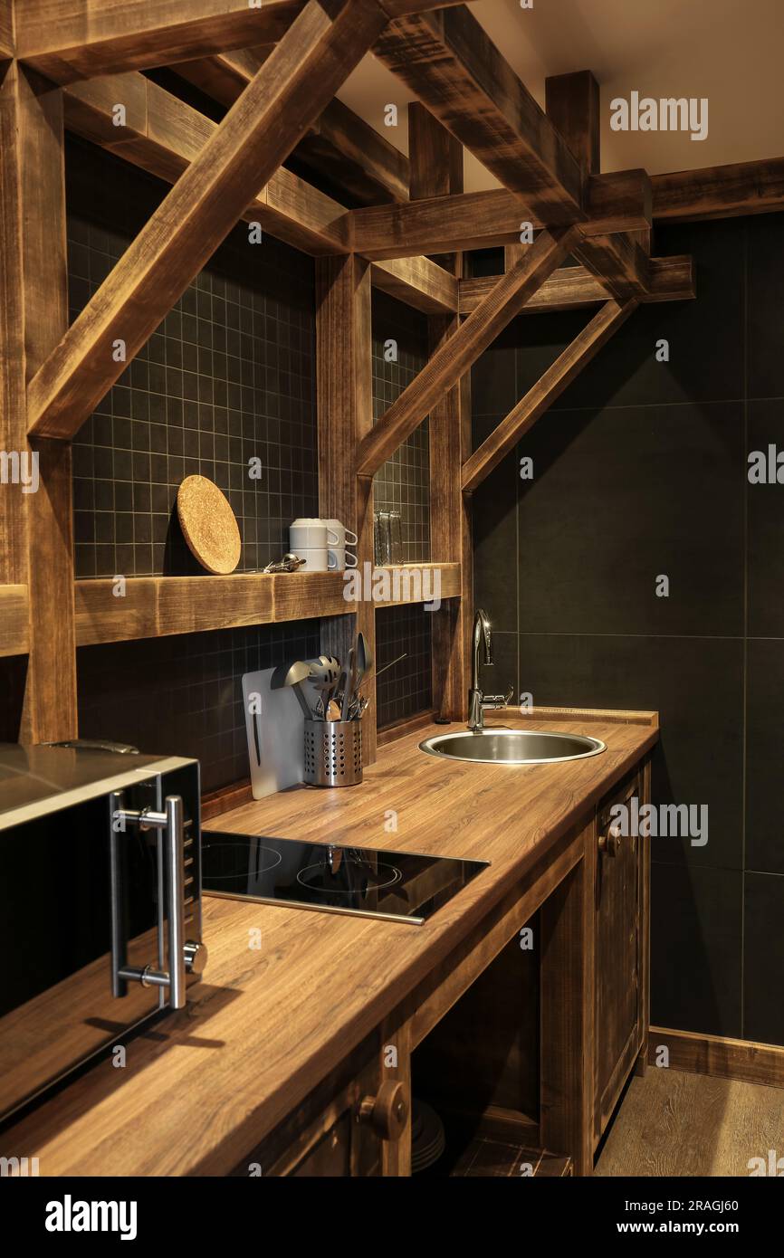 Hotel kitchen interior with stylish furniture and appliances Stock ...