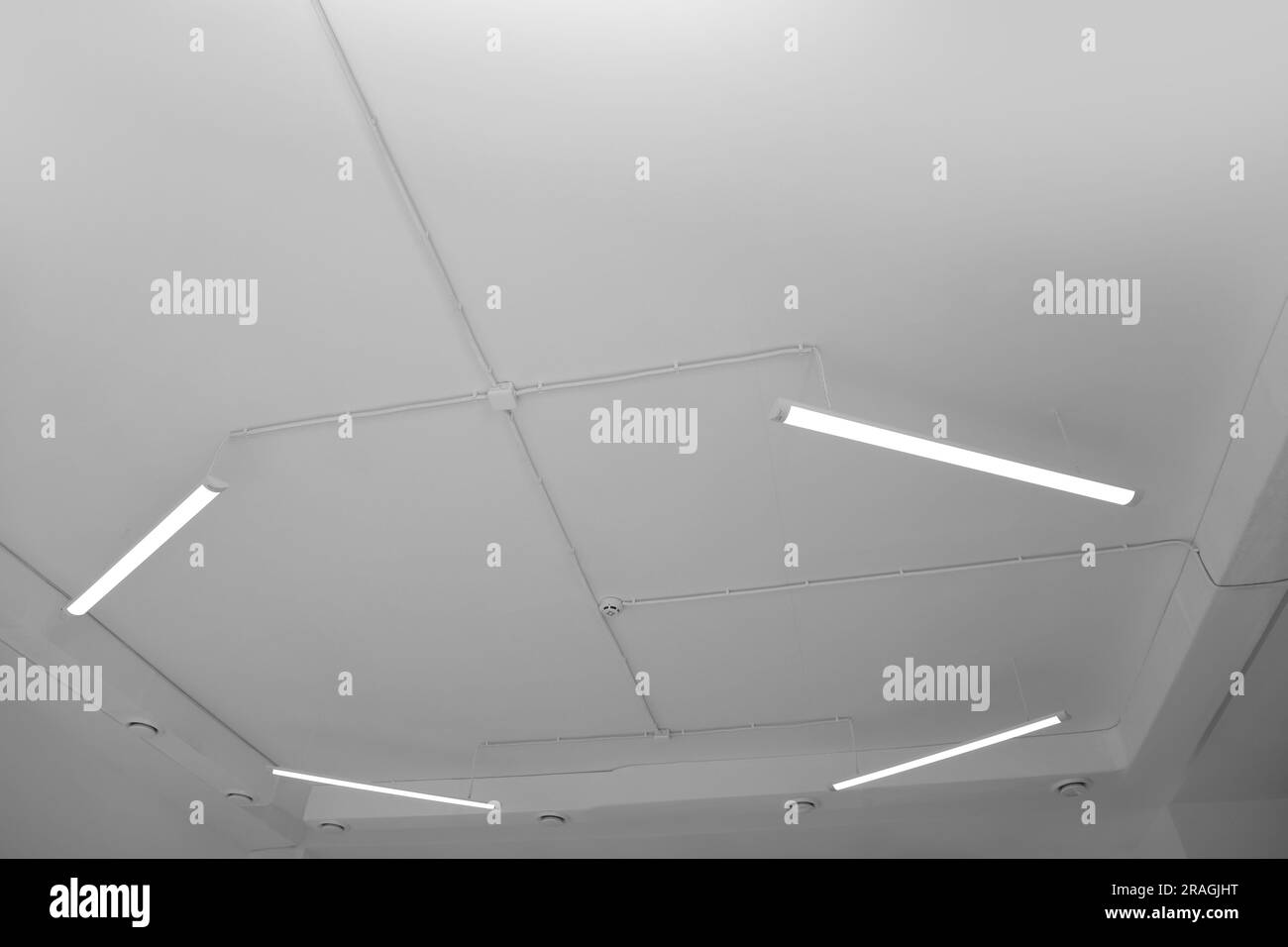White ceiling with modern lighting in office Stock Photo - Alamy
