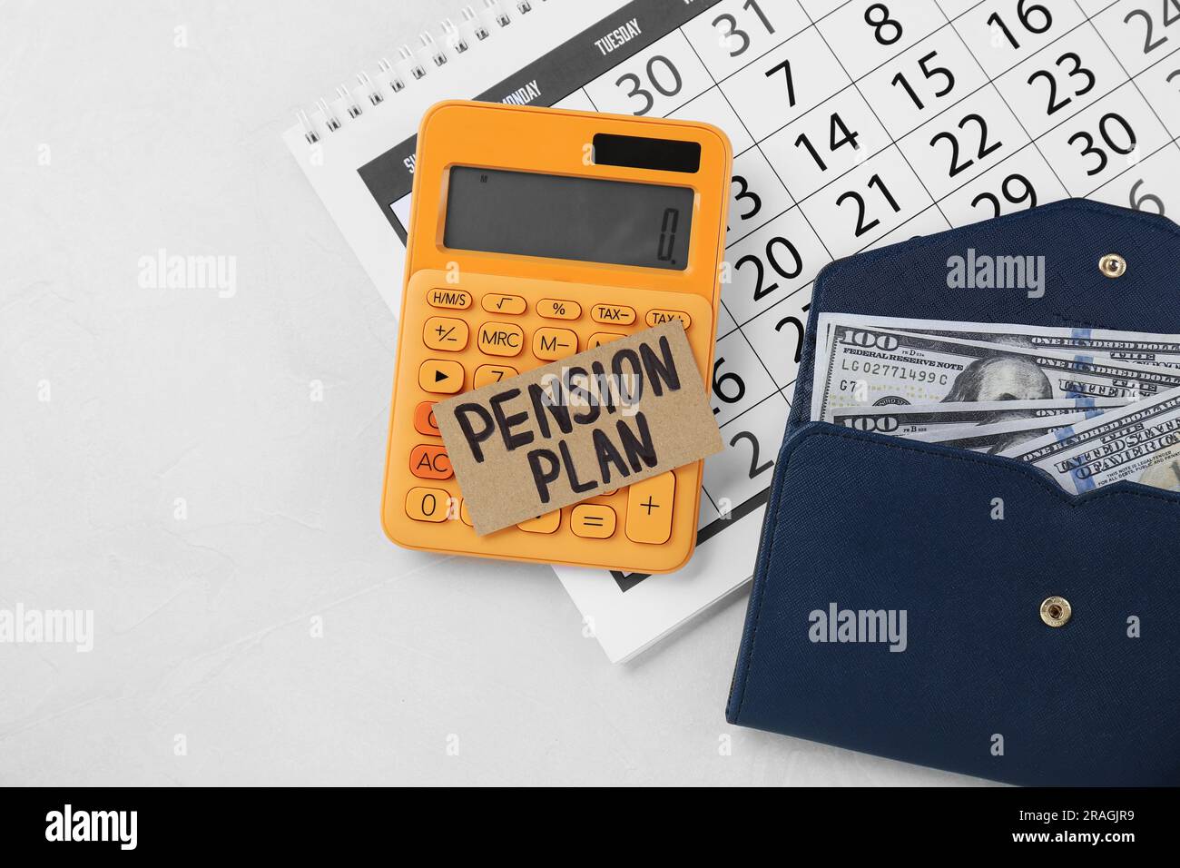 Card with phrase Pension Plan, dollar banknotes, calculator and ...