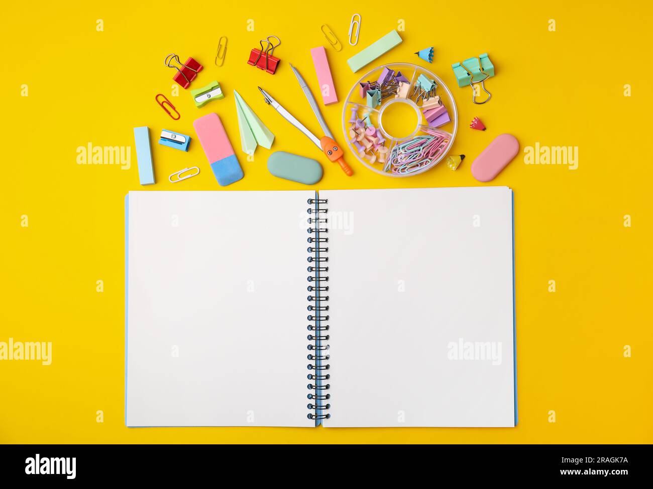 Flat lay composition with notebook and different school stationery on ...