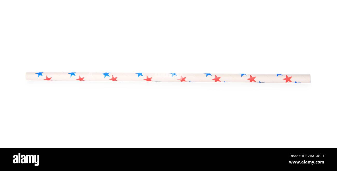 One paper straw with colorful stars for drinking isolated on white ...
