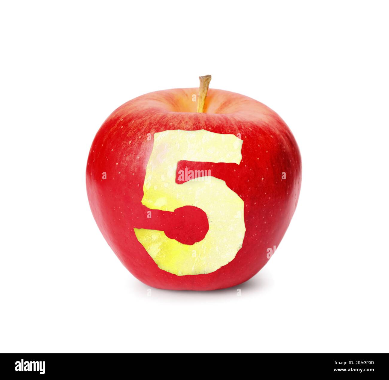 Red apple with carved number five as school grade on white background ...