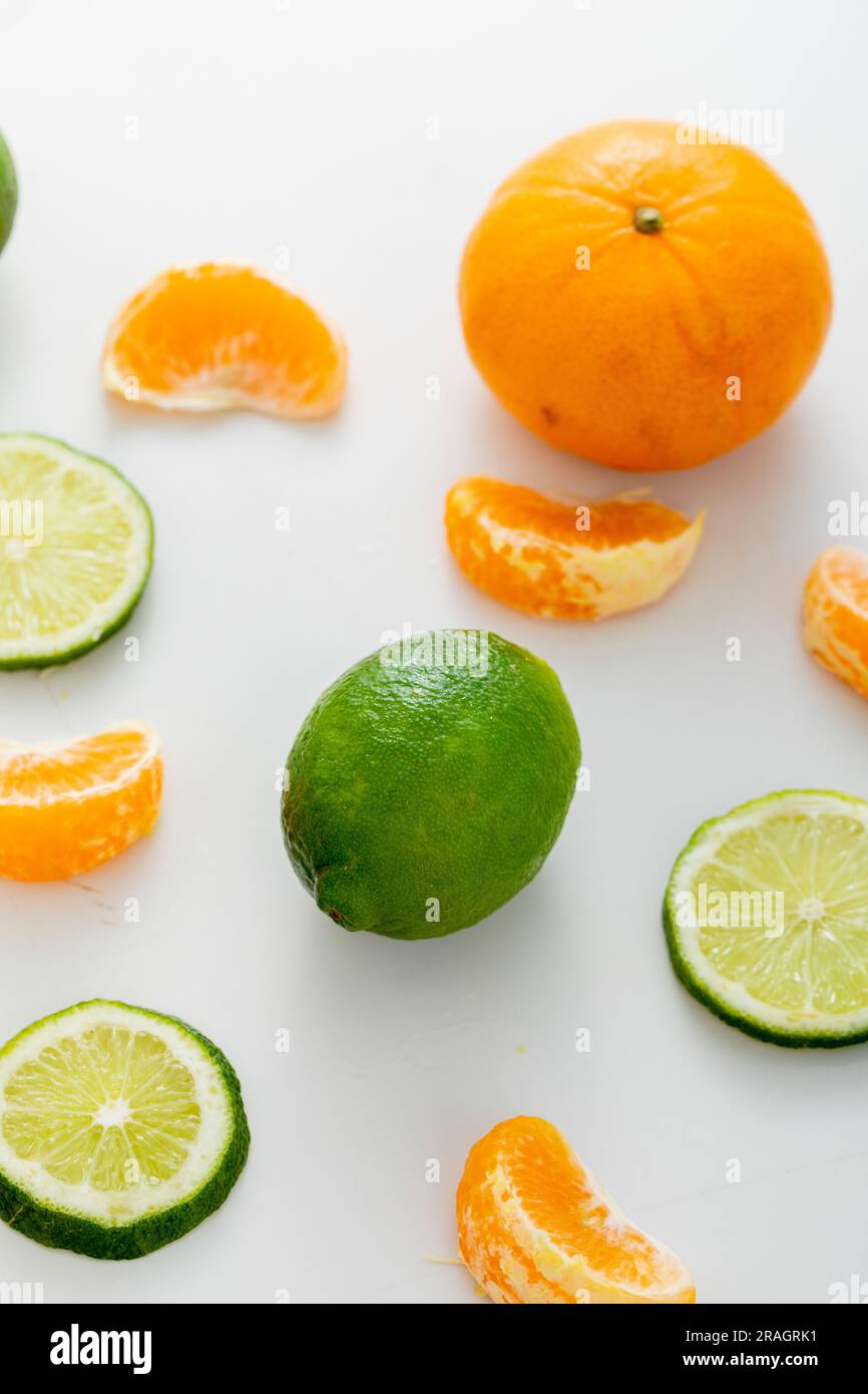 Citric fruits collage tangerine lime in a white background Stock Photo ...