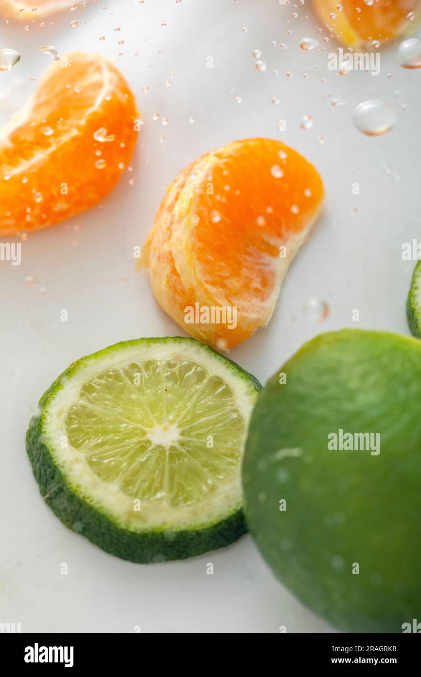 Citric fruits collage tangerine lime in a white background Stock Photo ...
